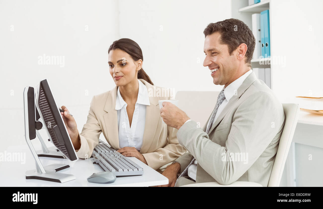 Business people using computer in office Stock Photo - Alamy