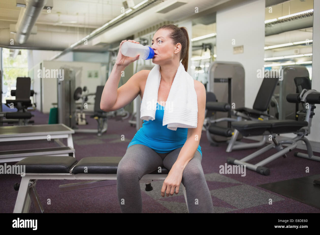 Active pretty brunette drinking hi-res stock photography and images - Alamy