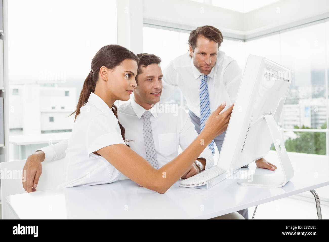 Business people using computer in office Stock Photo - Alamy