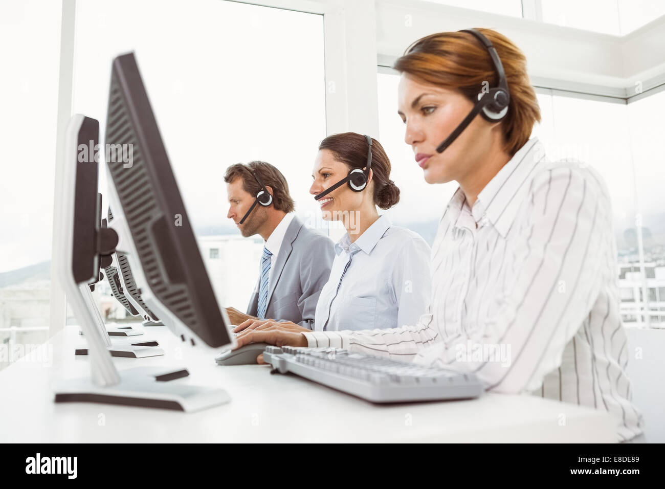 Business people in headsets in hi-res stock photography and images - Alamy