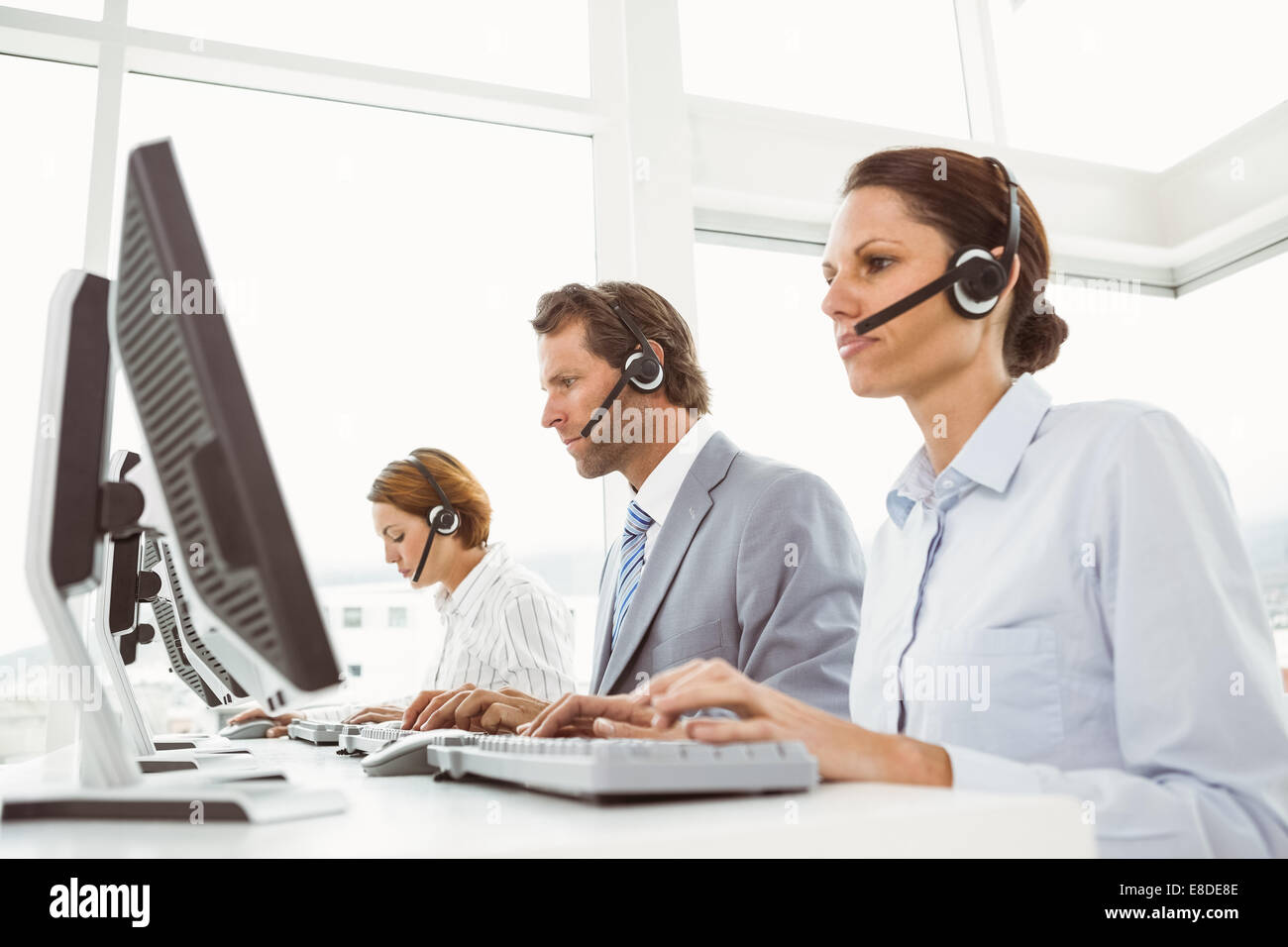 Business people in headsets in hi-res stock photography and images - Alamy