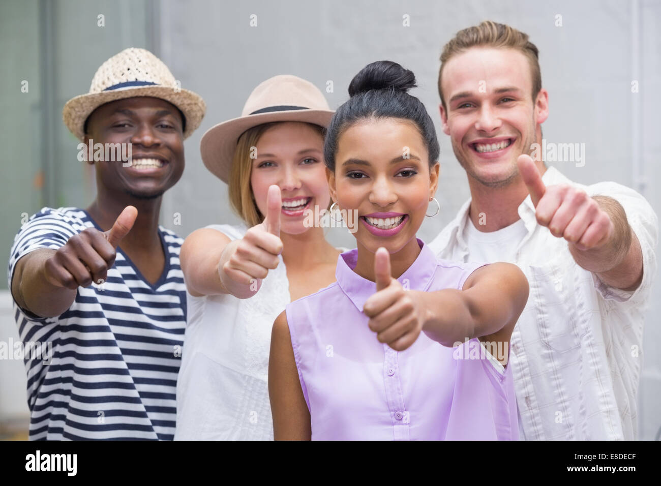 Thumbs up creative young woman hi-res stock photography and images - Alamy