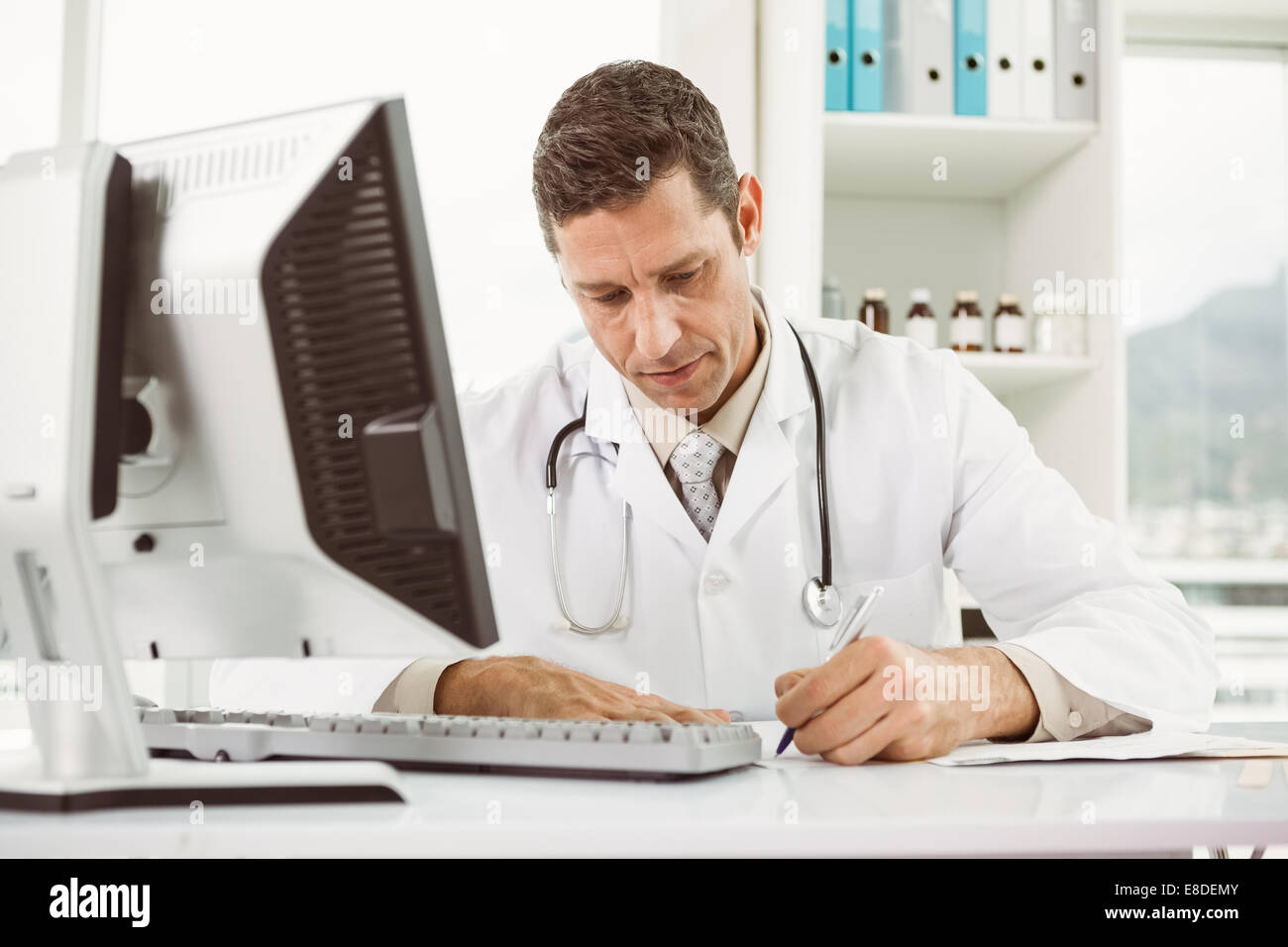 Doctor working desk hi-res stock photography and images - Alamy