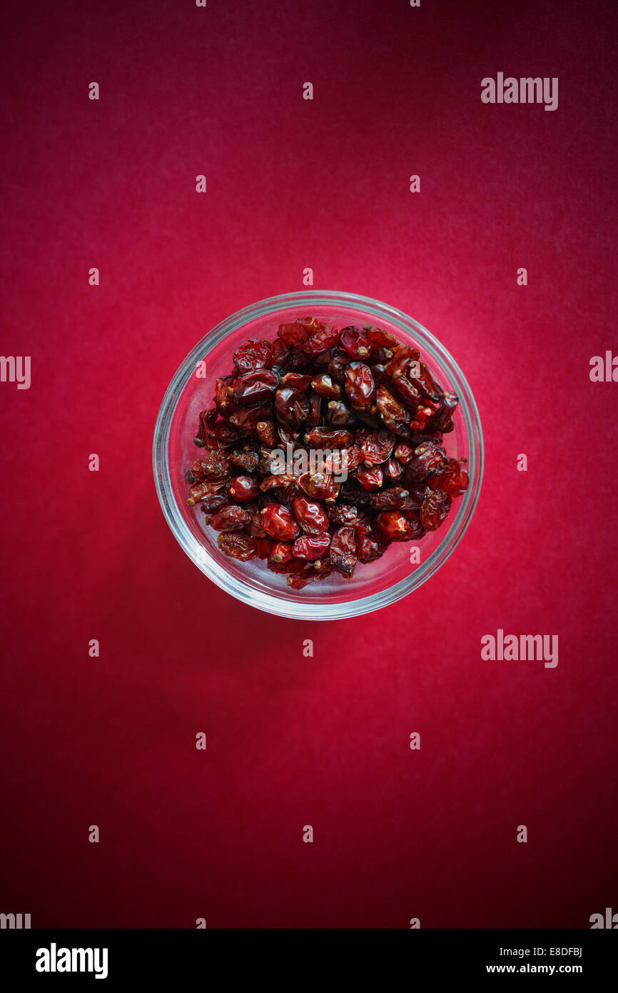 Dried barberry in a glass bowl Stock Photo - Alamy