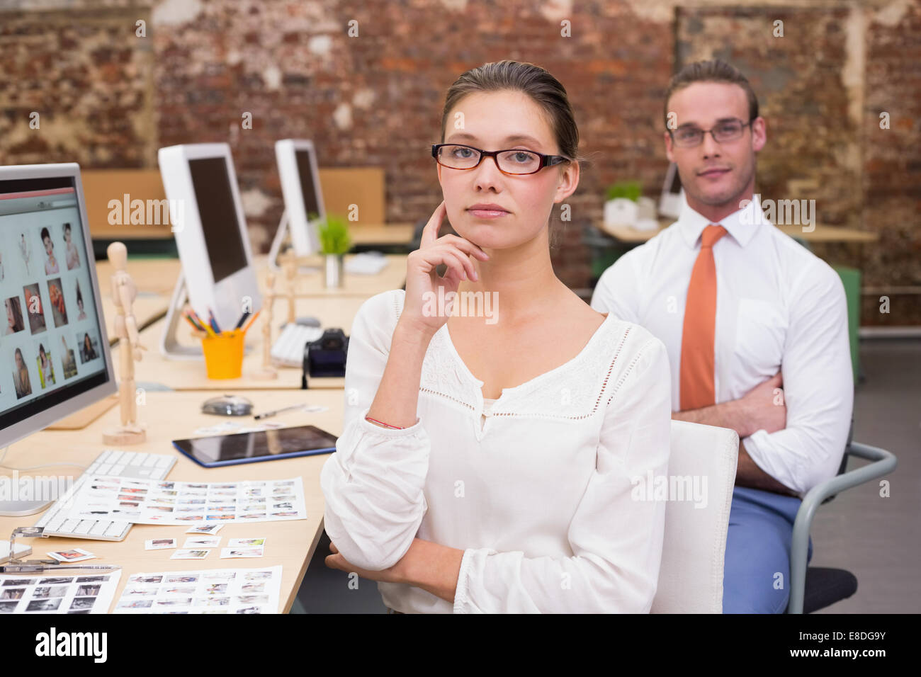 Portrait of photo editors in office Stock Photo - Alamy