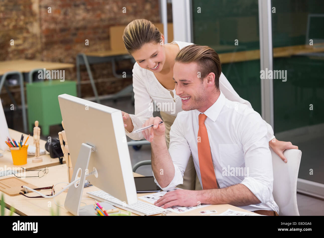 Photo editors using computer in office Stock Photo - Alamy