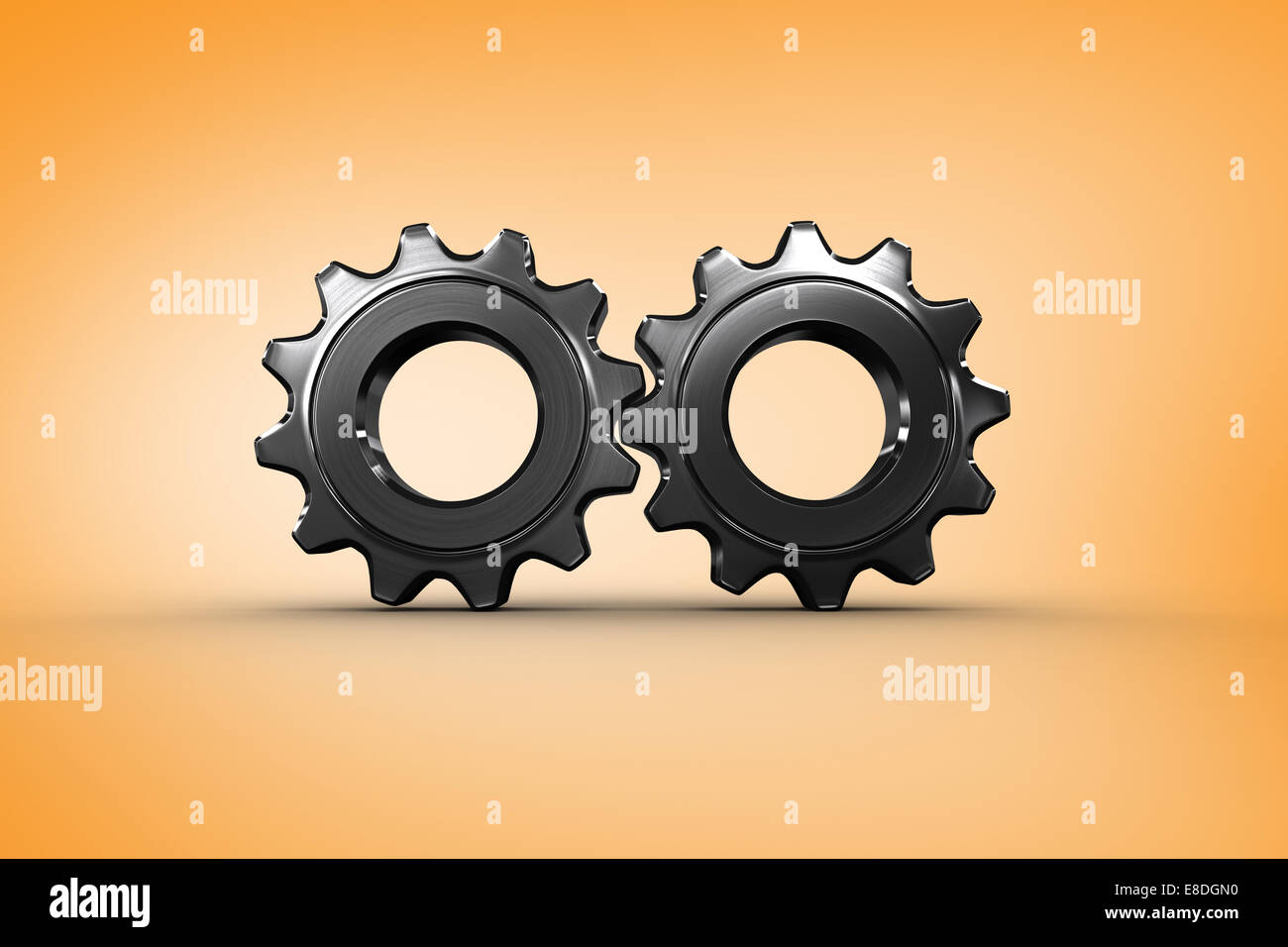 Composite image of metal cog and wheel connecting Stock Photo - Alamy