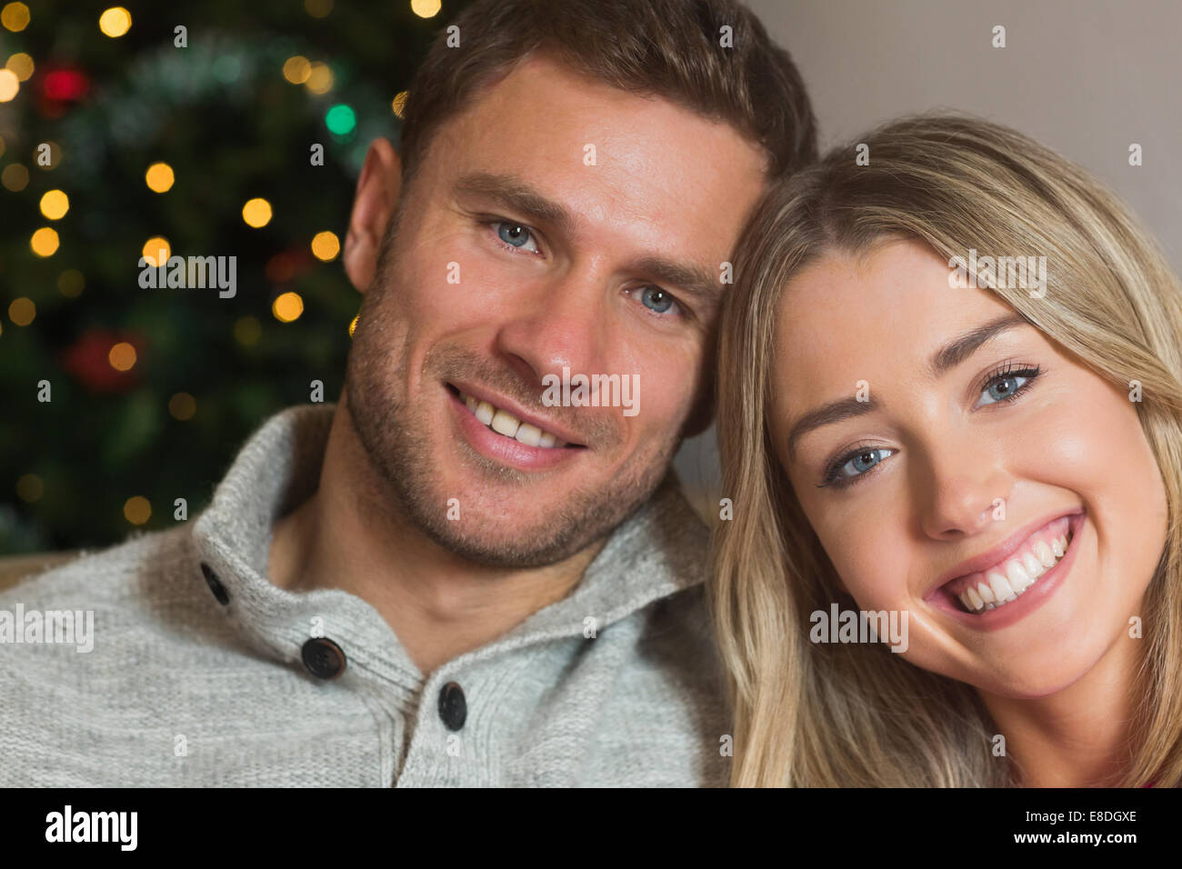 Smiling couple in their home Stock Photo - Alamy