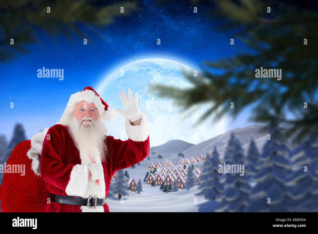 Composite image of santa claus waving Stock Photo - Alamy