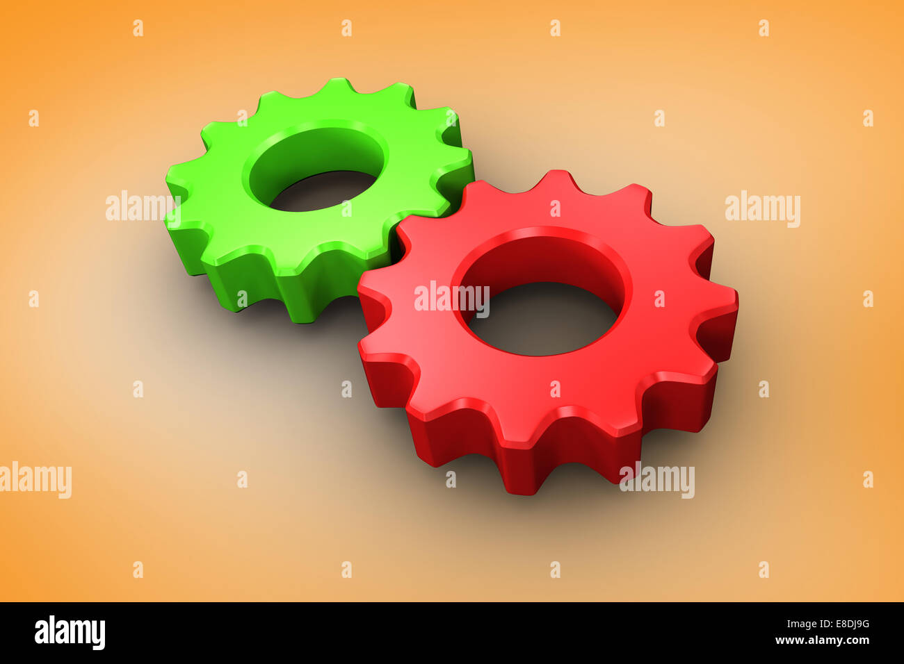 Composite image of red and green cog and wheel Stock Photo - Alamy