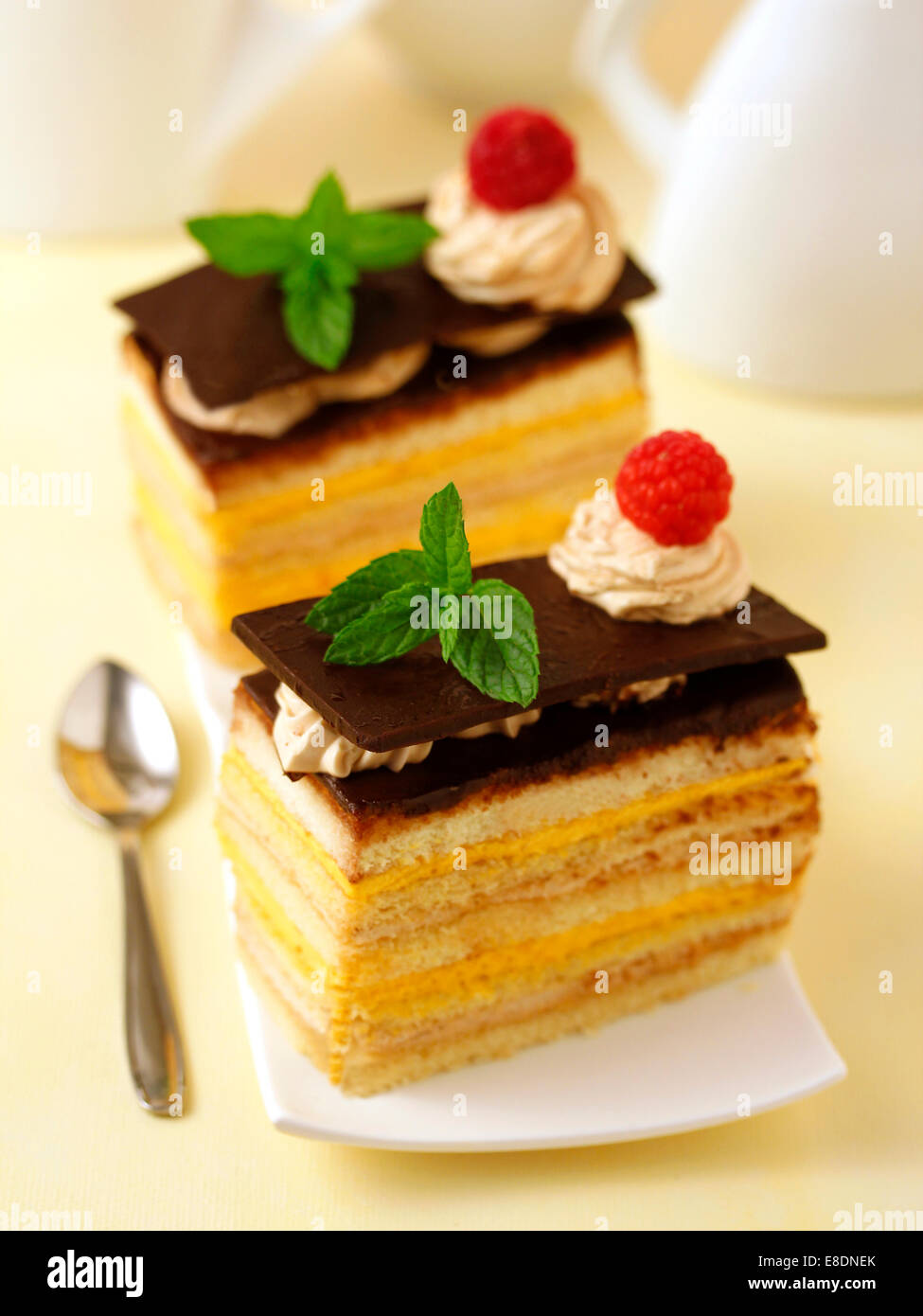 Sponge cake with custard and tiramisu. Recipe available Stock Photo - Alamy