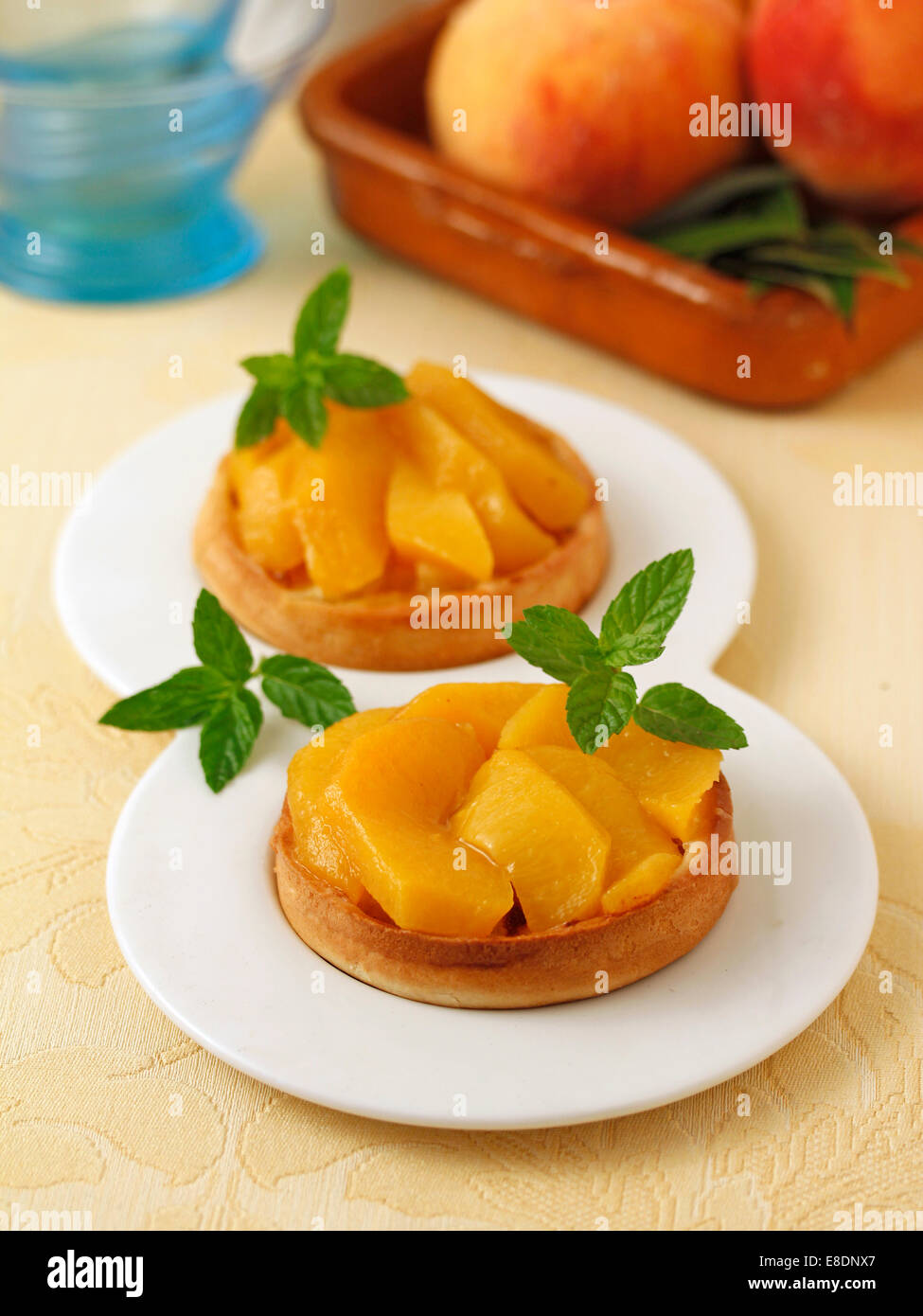 Peach tartlets. Recipe available Stock Photo - Alamy