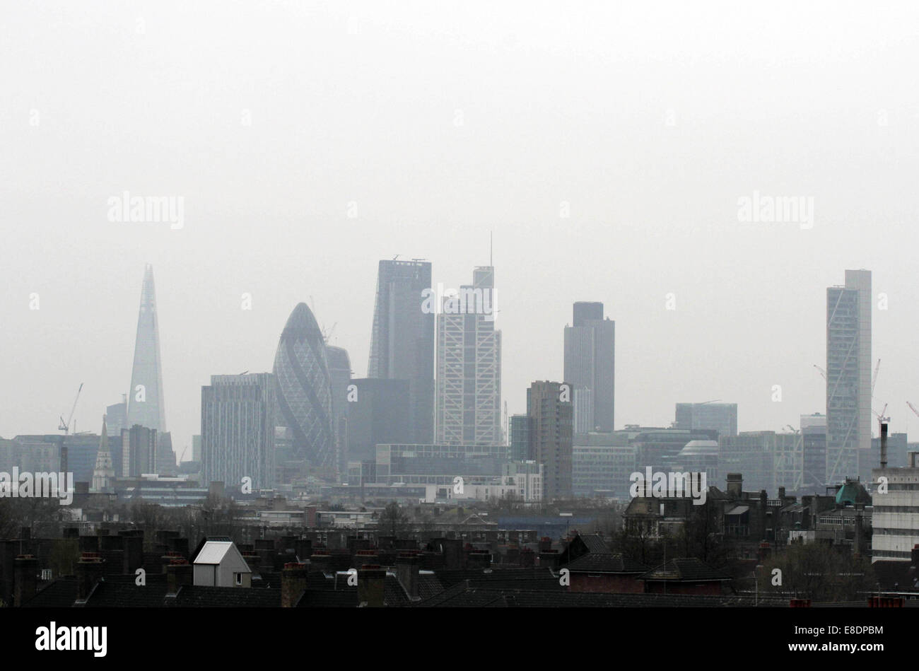 Recognisable London landmarks are shrouded in a thick layer of smog ...