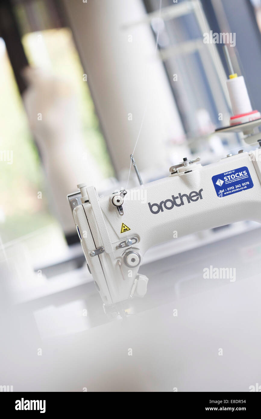 cotton reel on a sewing machine Stock Photo - Alamy