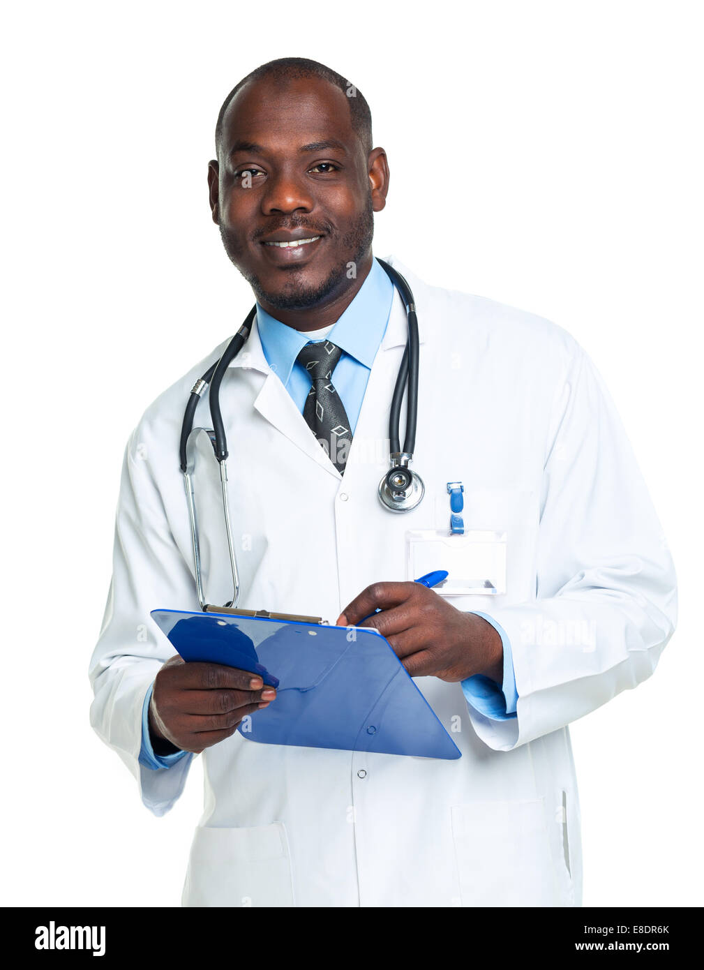 Portrait of a smiling male doctor writing in the notepad on white ...