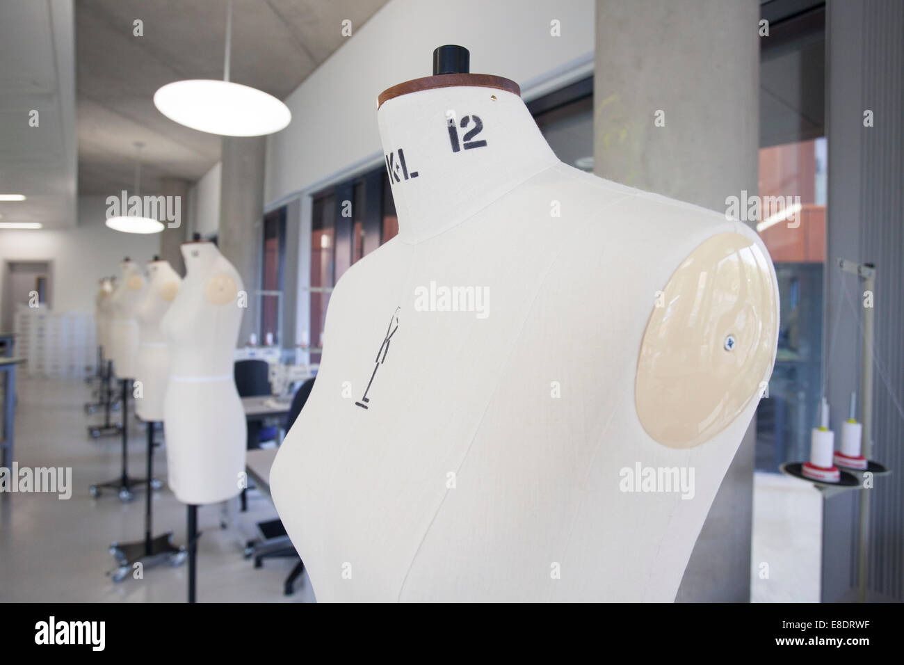 fashion dummies stood in empty room Stock Photo - Alamy