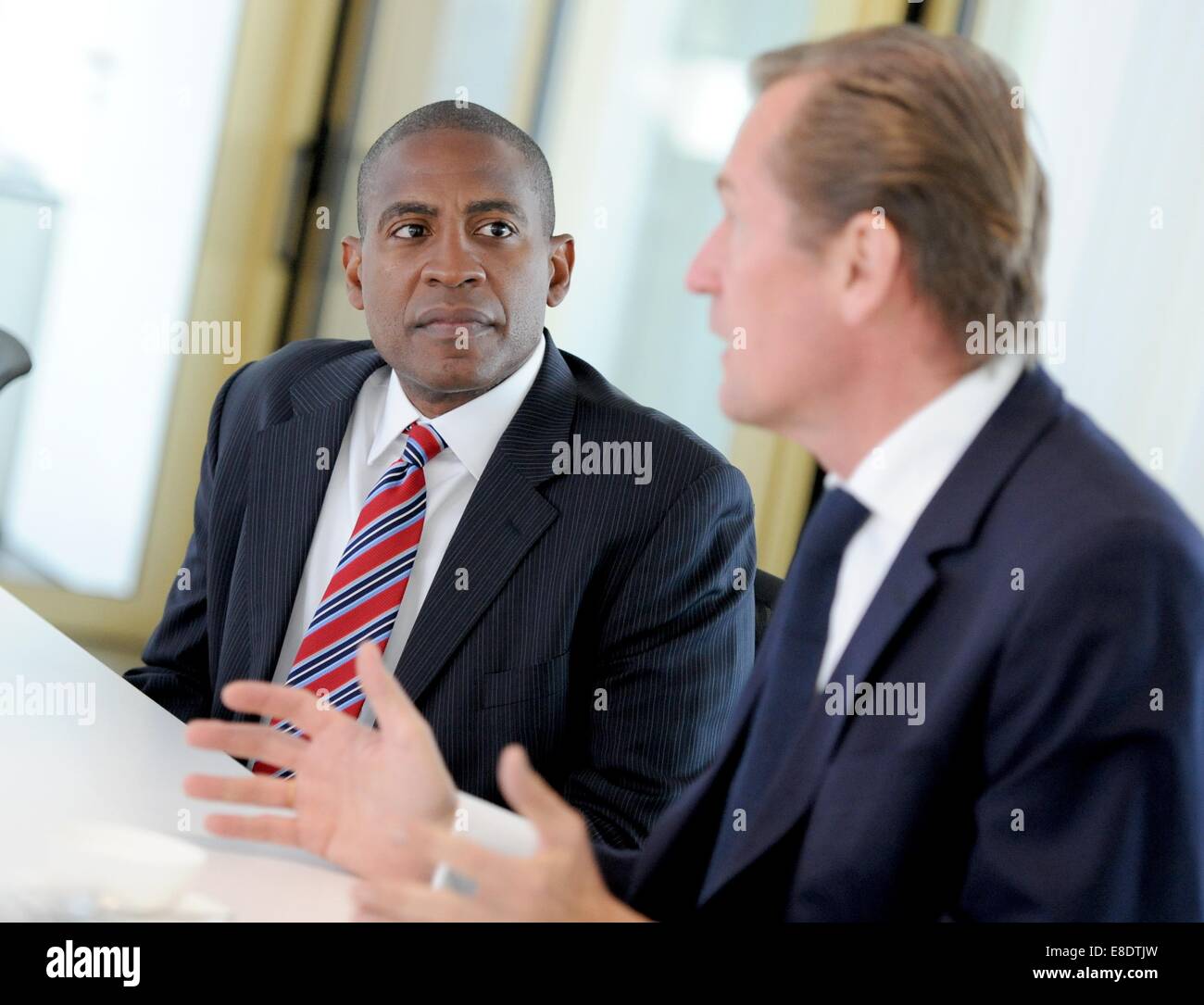 Carlos Watson (L), founder of the US online magazine OZY.com, and ...