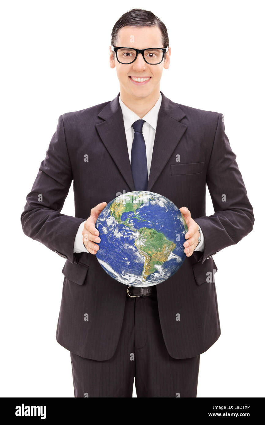 Young businessman holding the world isolated on white background, earth ...