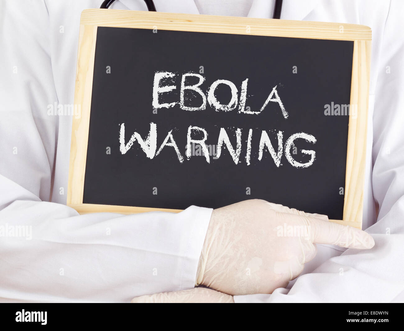 Doctor shows information: Ebola warning Stock Photo - Alamy