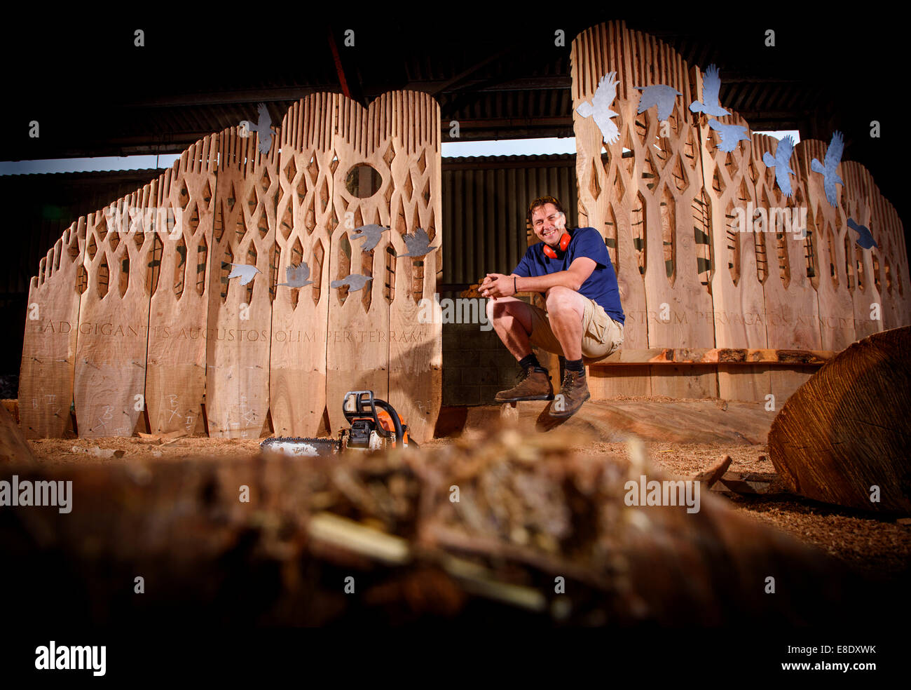 Keith Pettit working on his Elm sculpture in the village of Lullington ...
