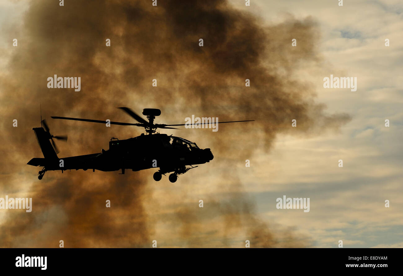 APACHE ATTACK HELICOPTER WITH CLOUD OF SMOKE LANDSCAPE Stock Photo - Alamy