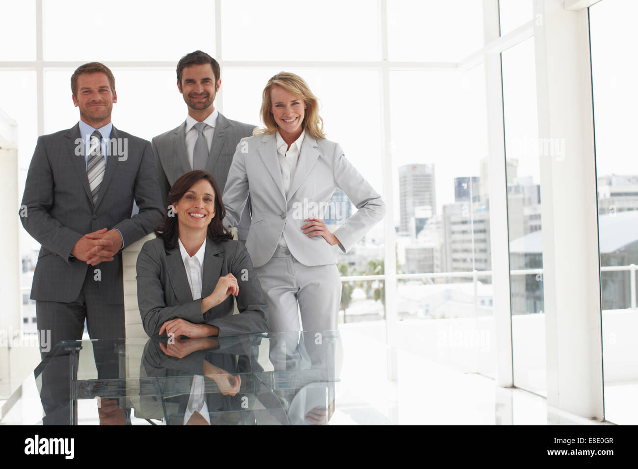 Boss with her team Stock Photo - Alamy