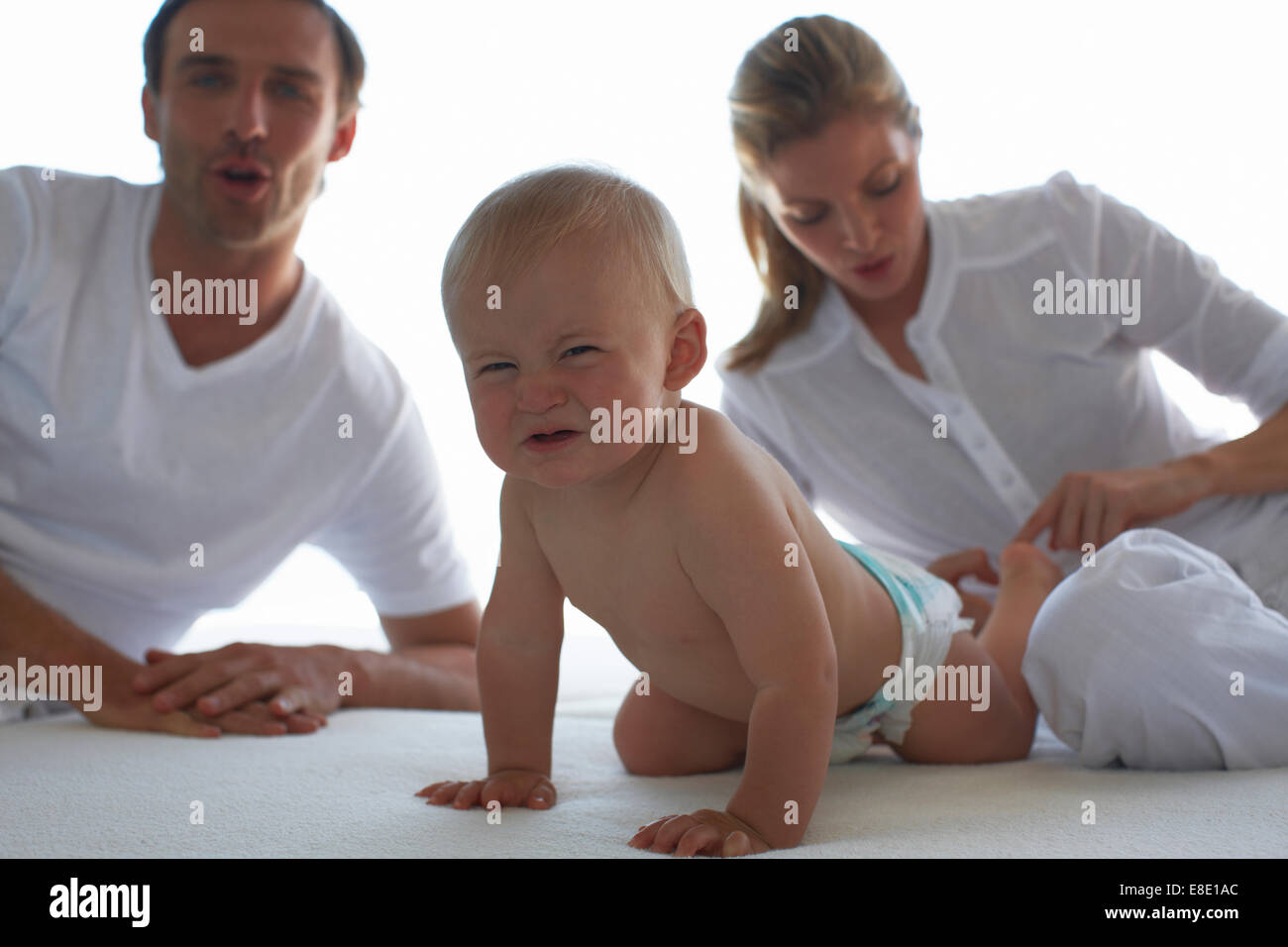 Parents with their baby Stock Photo - Alamy