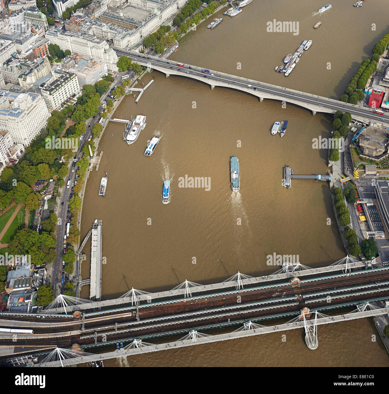 Aerial view of Hungerford and Waterloo Bridges over the river Thames ...