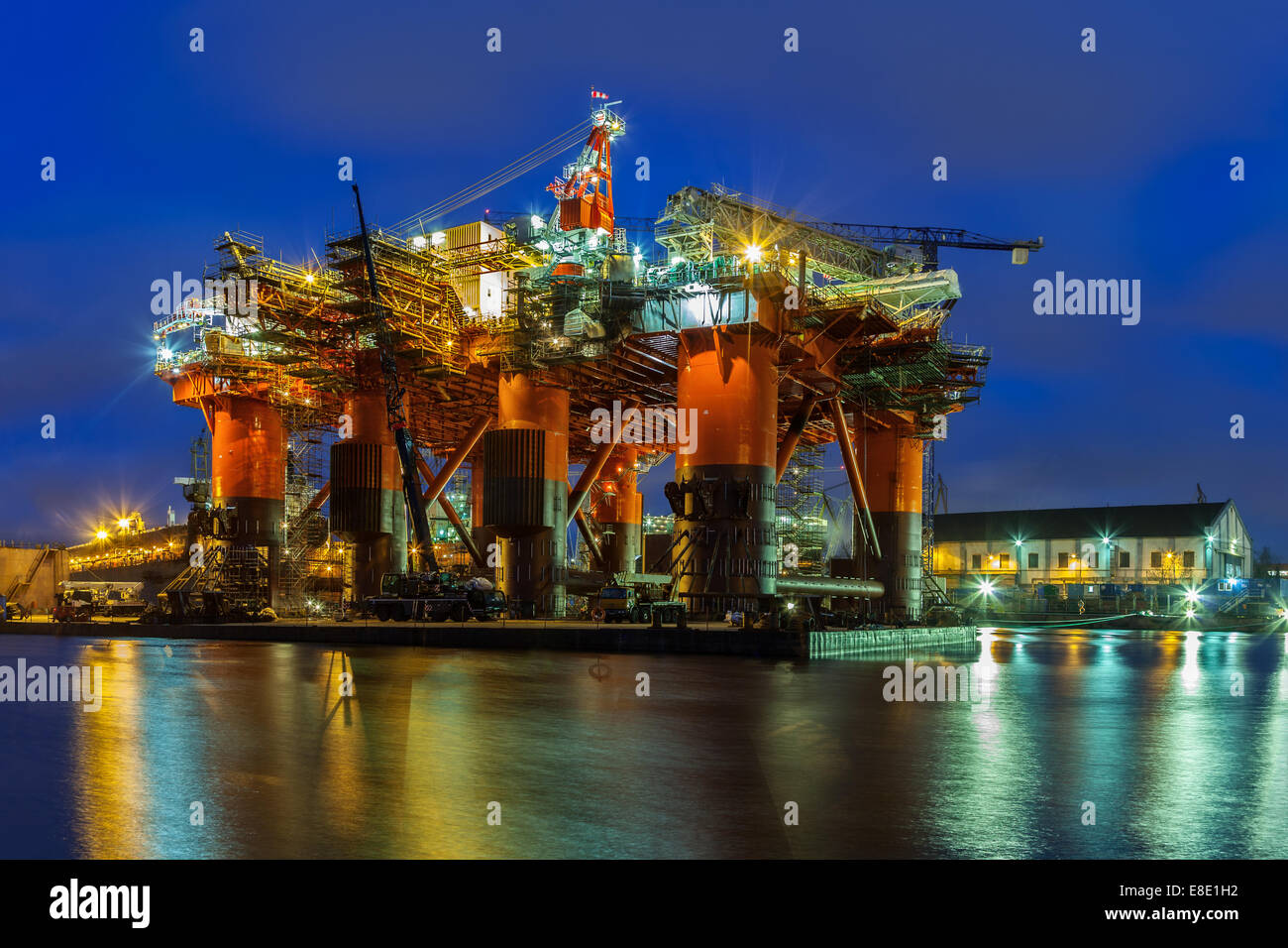 Oil Rig in the shipyard for maintenance at night Stock Photo - Alamy
