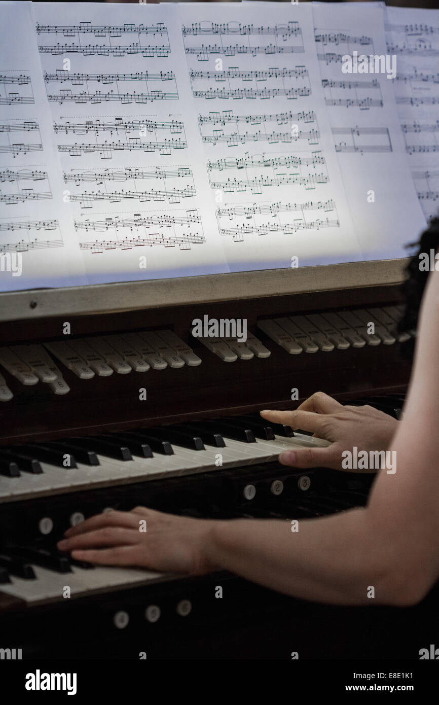 Hands of Someone playing Organ In a Church Stock Photo - Alamy