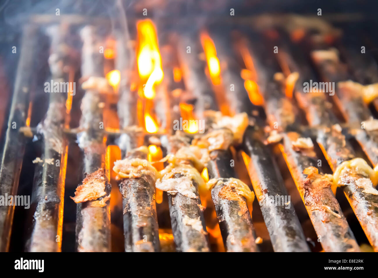 flame showing through the grill after the BBQ has been eaten Stock ...