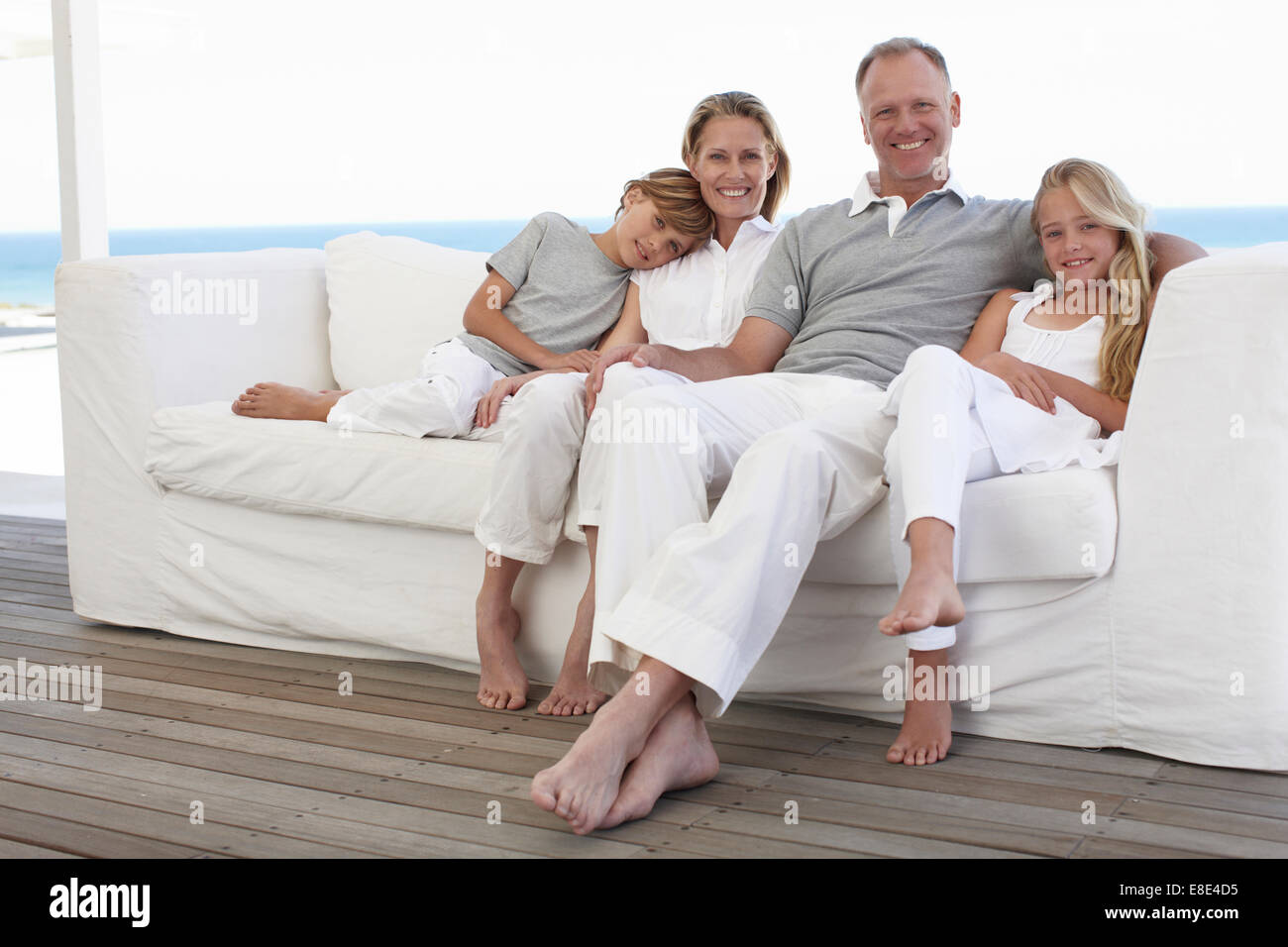Family in their house Stock Photo - Alamy