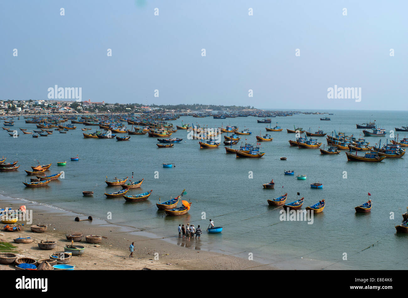 Vietnam Mui Ne village - March 2012: The fishing fleet of Mui Ne ...