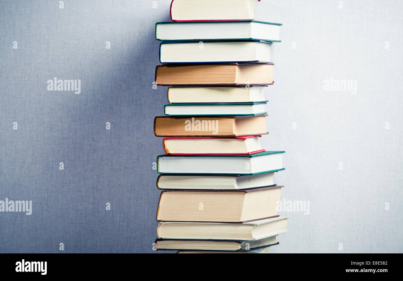 Books stack vintage tall hi-res stock photography and images - Alamy