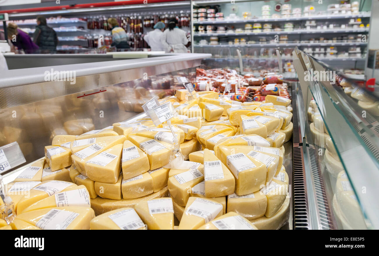 Showcase with cheese ready to sale in supermarket Magnit. Russia's ...