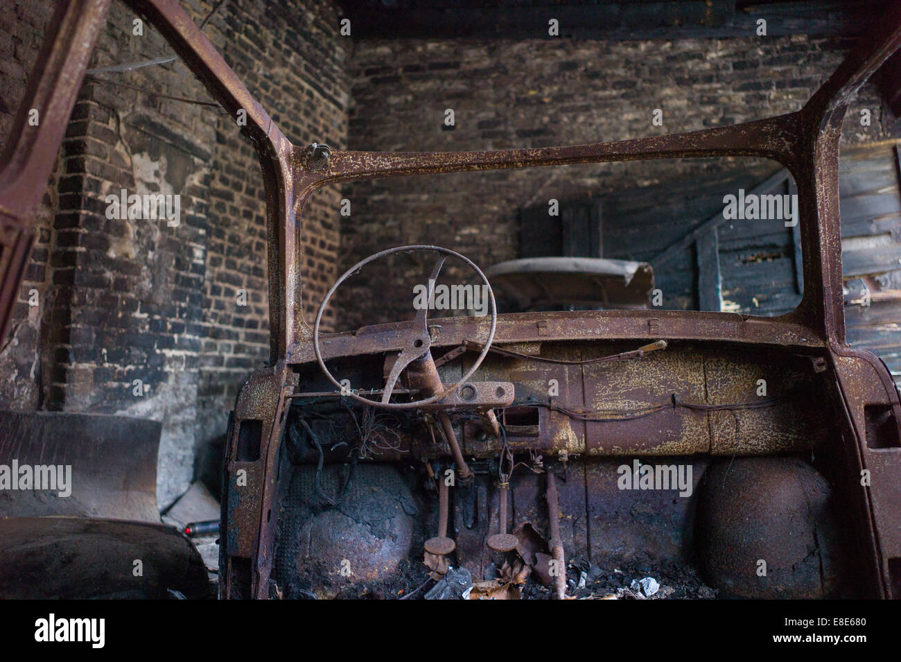 Berlin, Germany, burned-out car in a garage in Prenzlauer Berg Stock ...