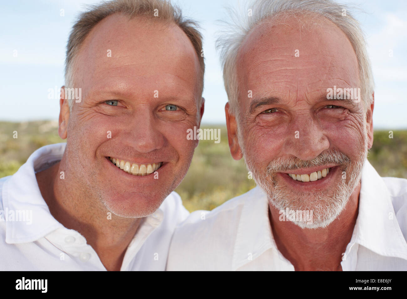 Two men smile white background hi-res stock photography and images - Alamy