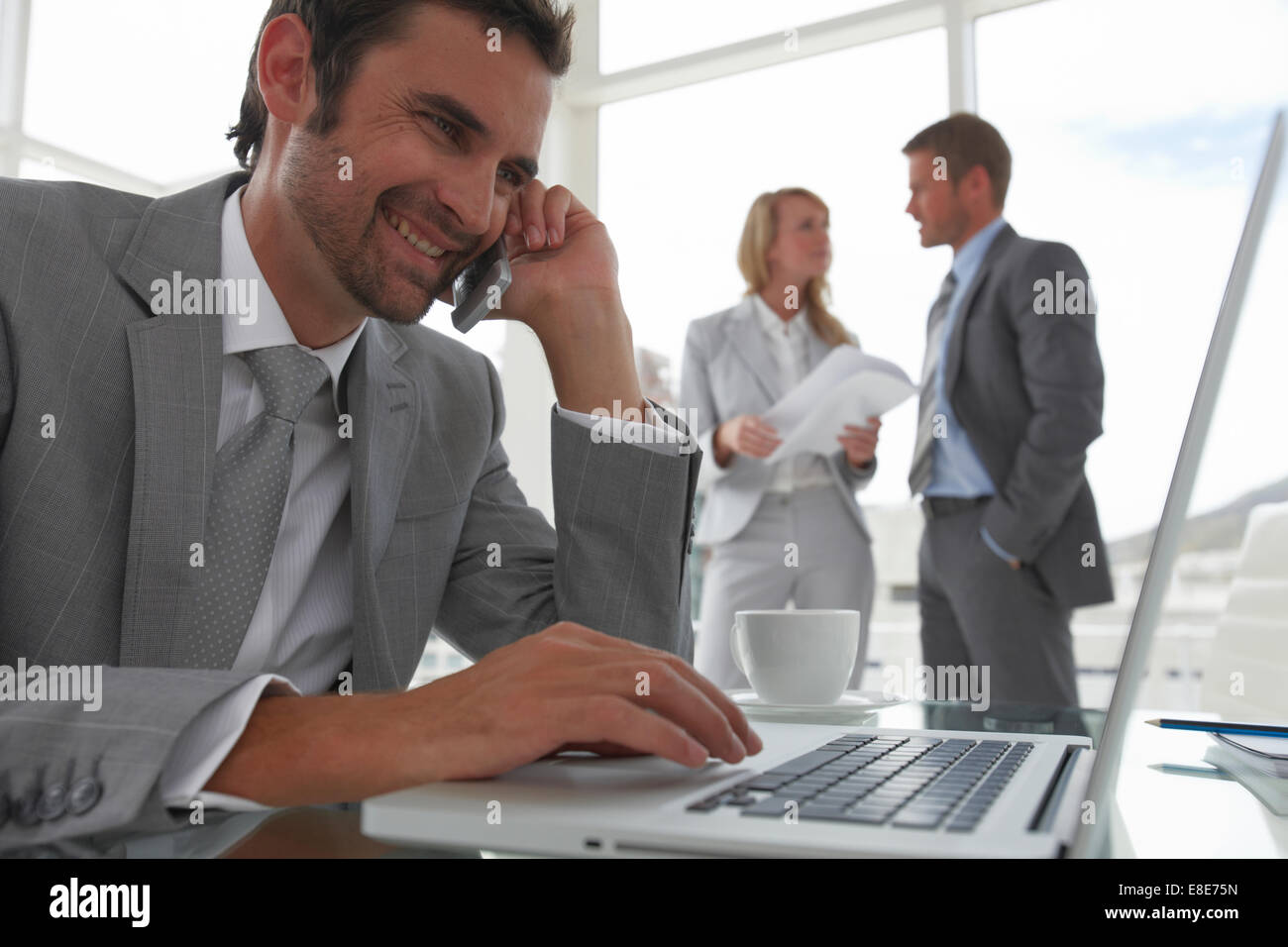 Young man at work Stock Photo - Alamy