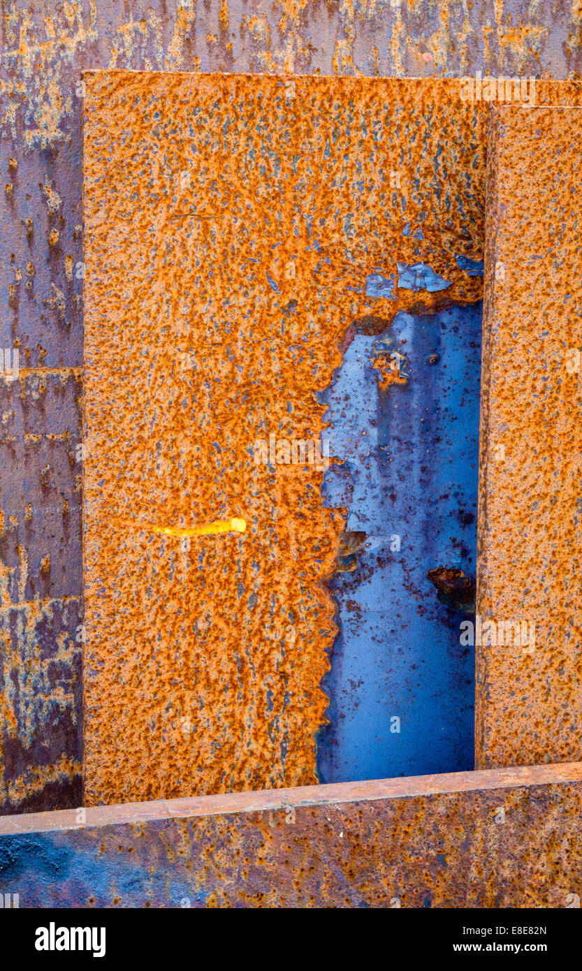 Rust patterns on iron sheets in an engineers yard Stock Photo - Alamy