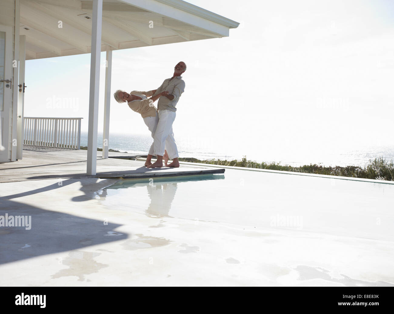 Man dancing swimming pool hi-res stock photography and images - Alamy