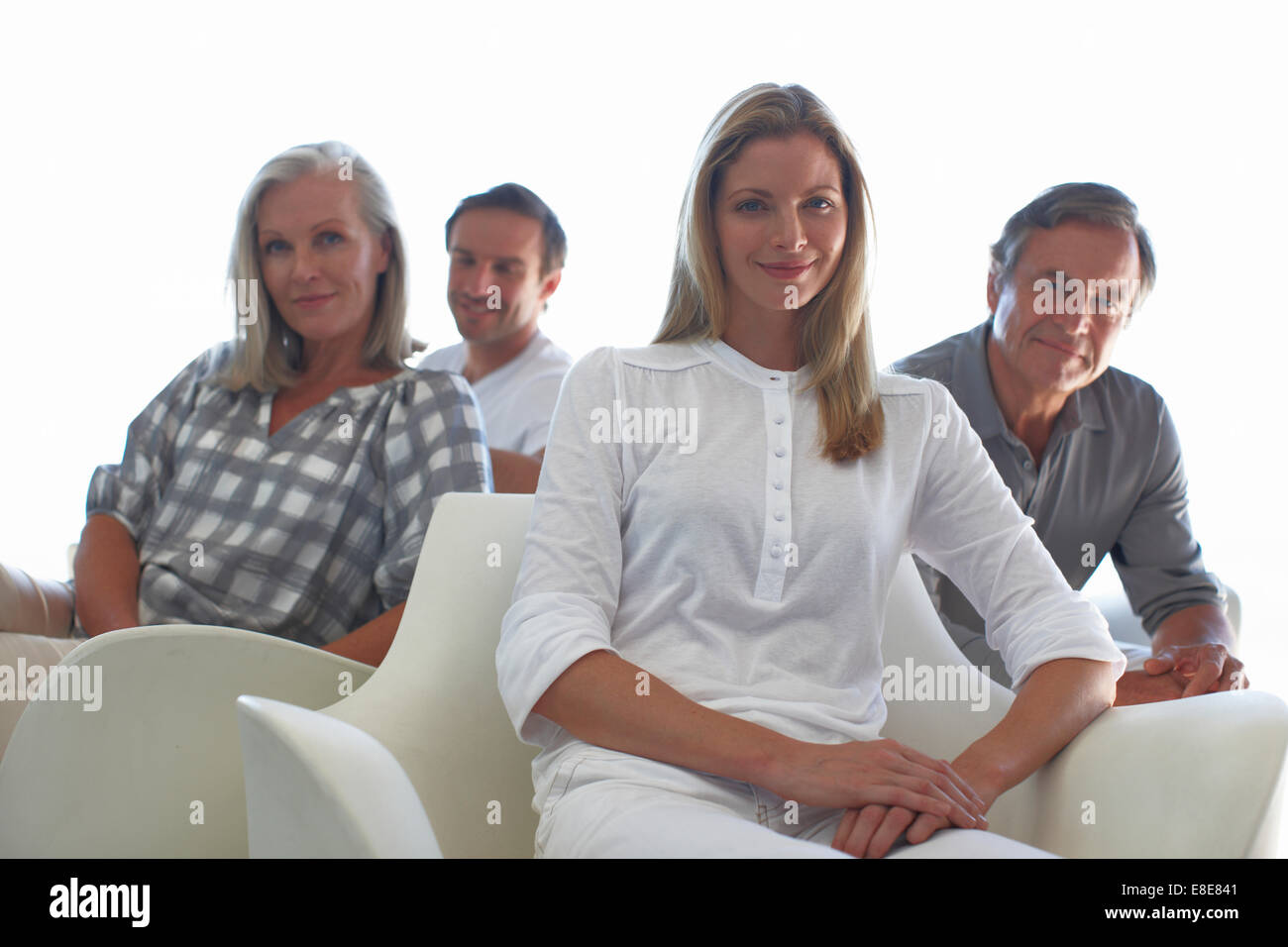 Woman with her family Stock Photo - Alamy