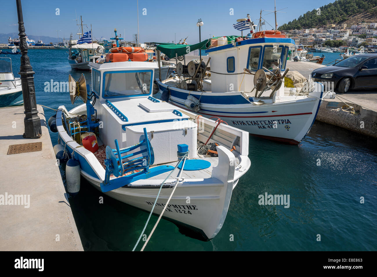 Old colorful wooden greek fishing boats Pothia Kalymnos Stock Photo - Alamy