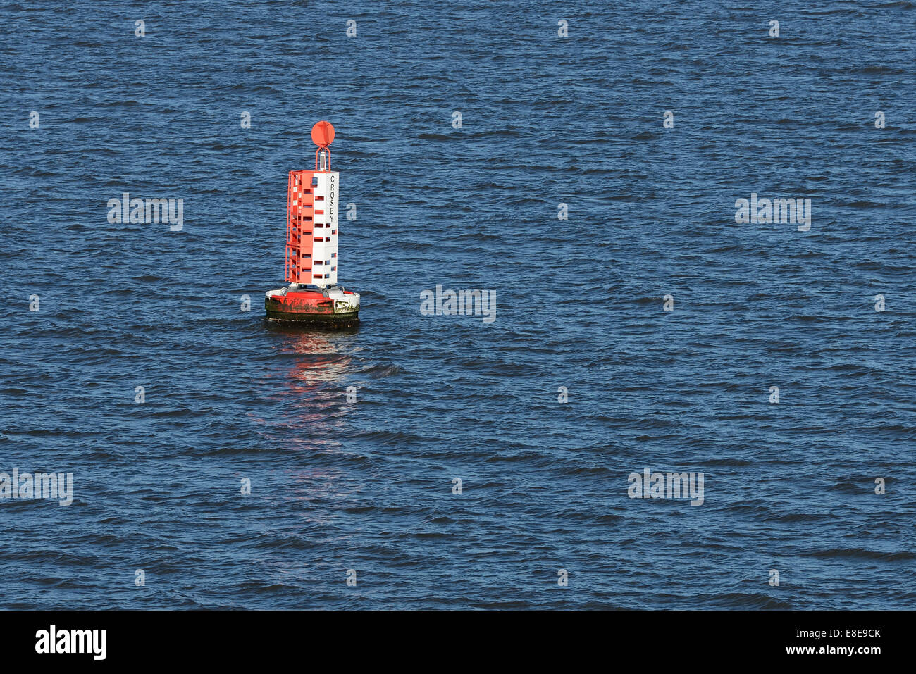 Navigation buoy marking the safe shipping channel in the River Mersey ...