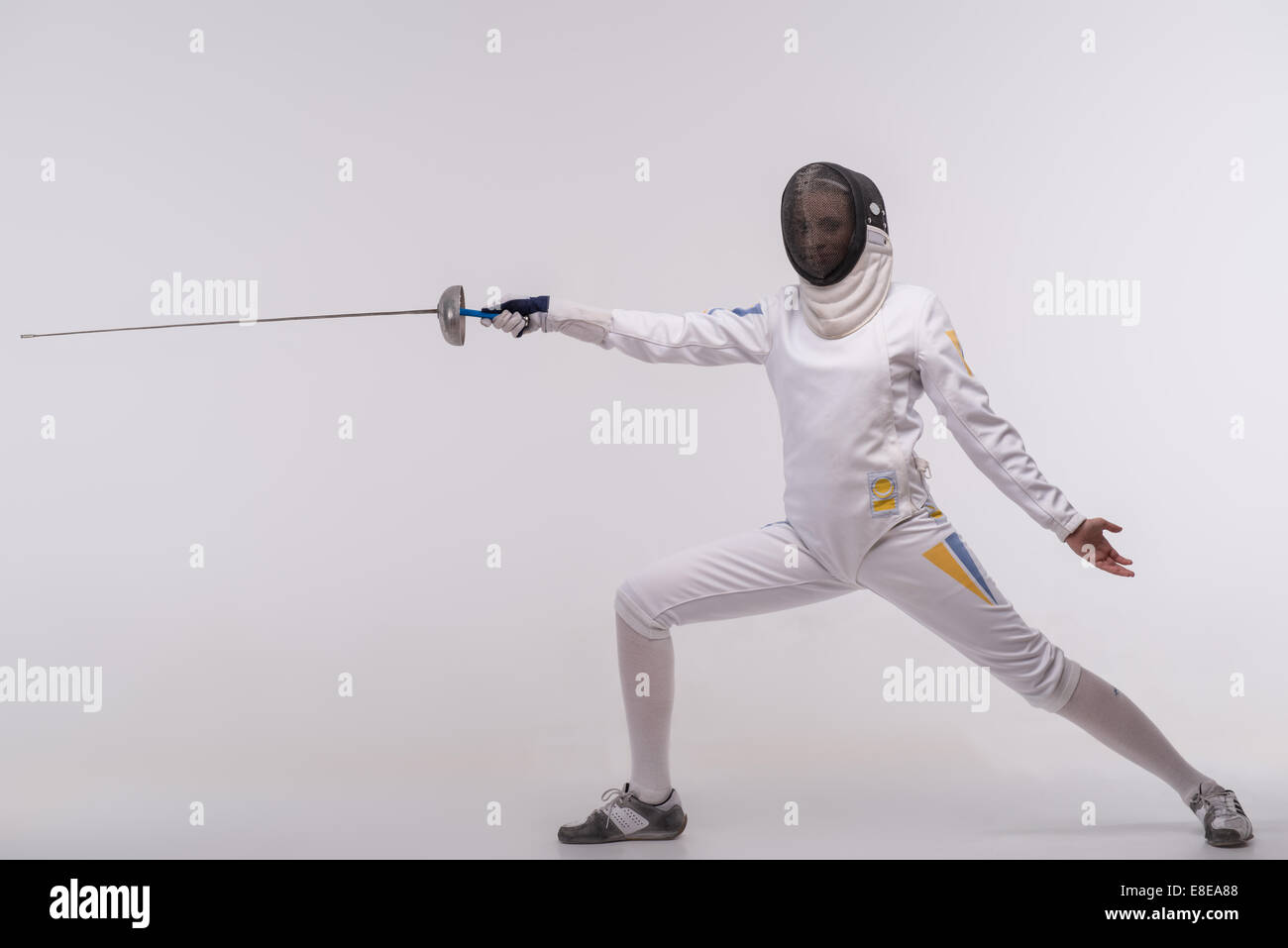 Young woman engaging in fencing Stock Photo - Alamy