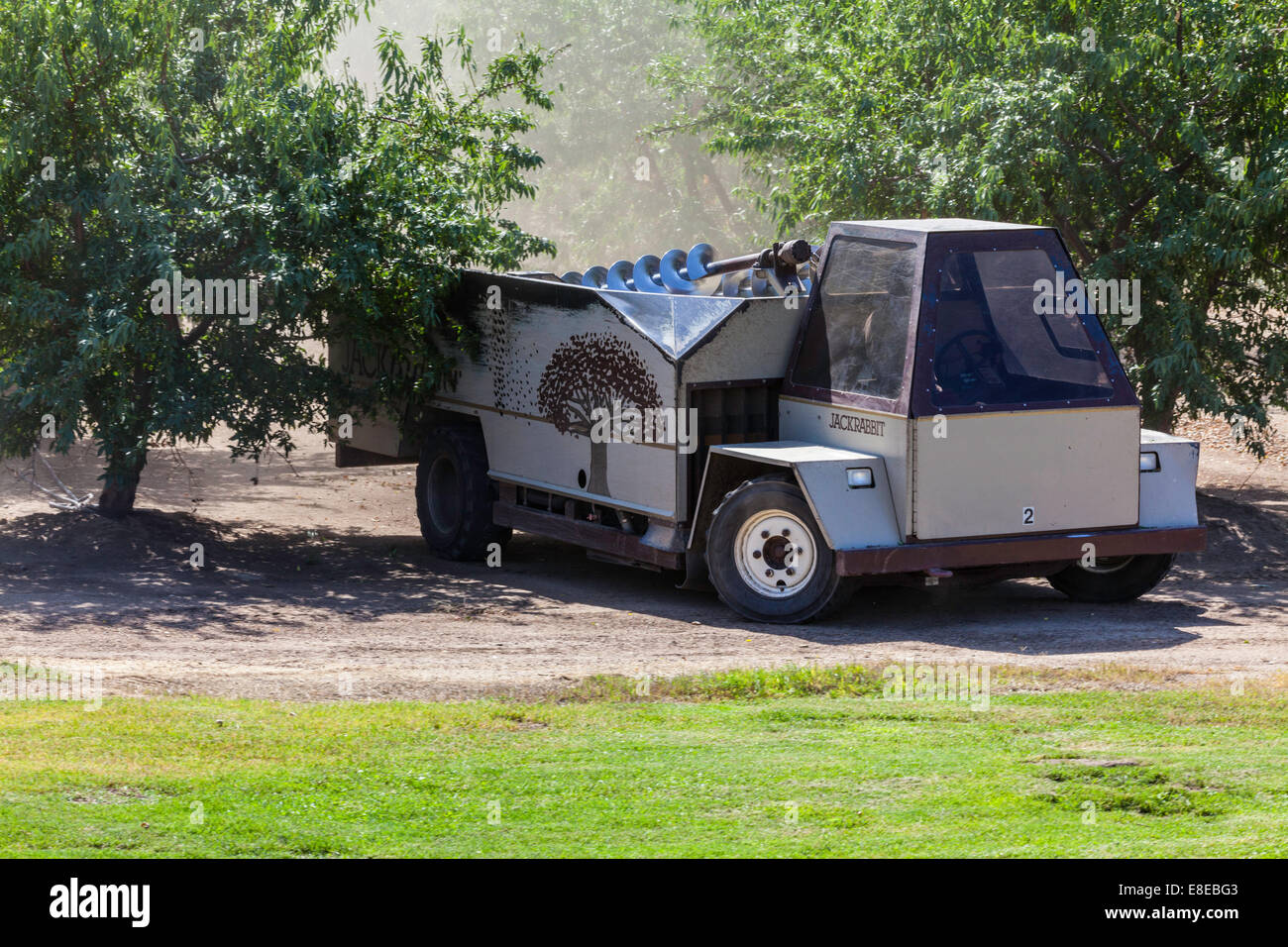 An Almond harvester that picks up almonds off the ground in Modesto ...