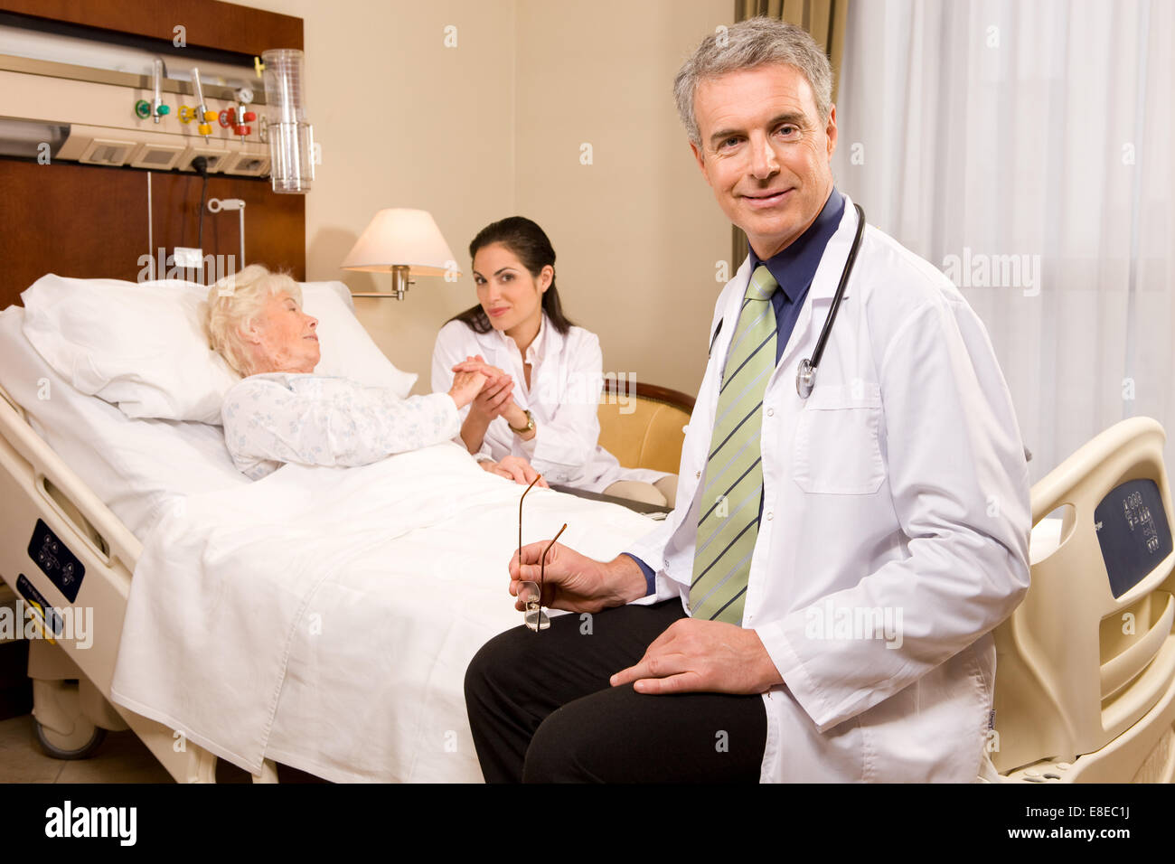 Doctors at work Stock Photo - Alamy