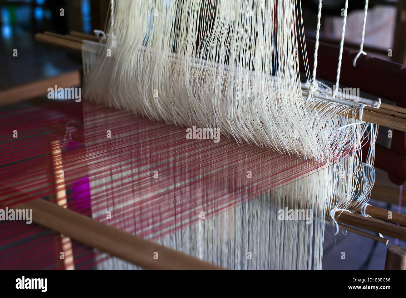 Vintage manual weaving loom with unfinished textile work Stock Photo ...