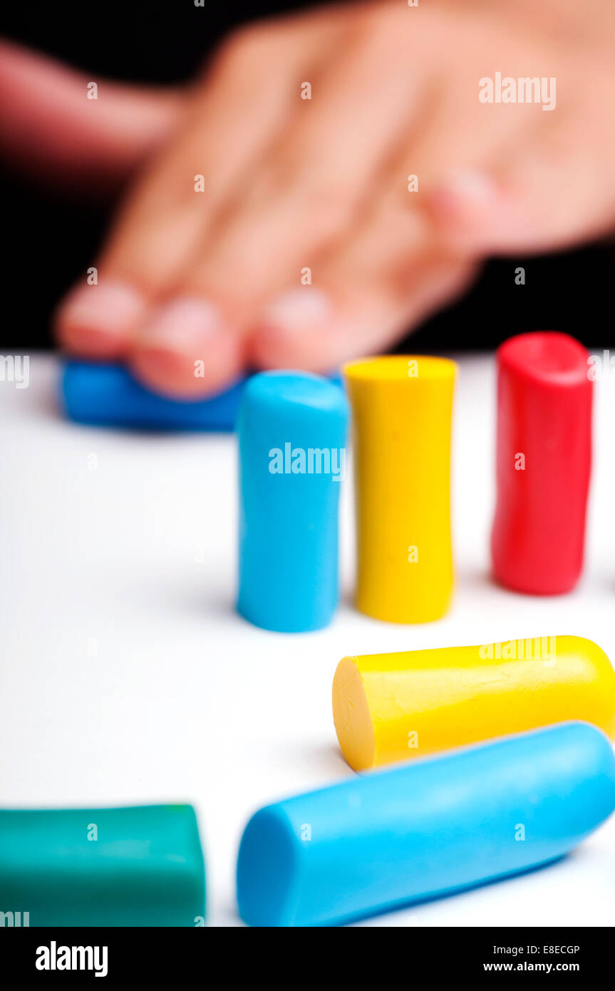 Rolling the polymer clay Stock Photo - Alamy