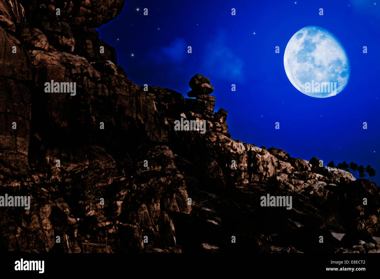 Night landscape with the moon over the rocks Stock Photo - Alamy