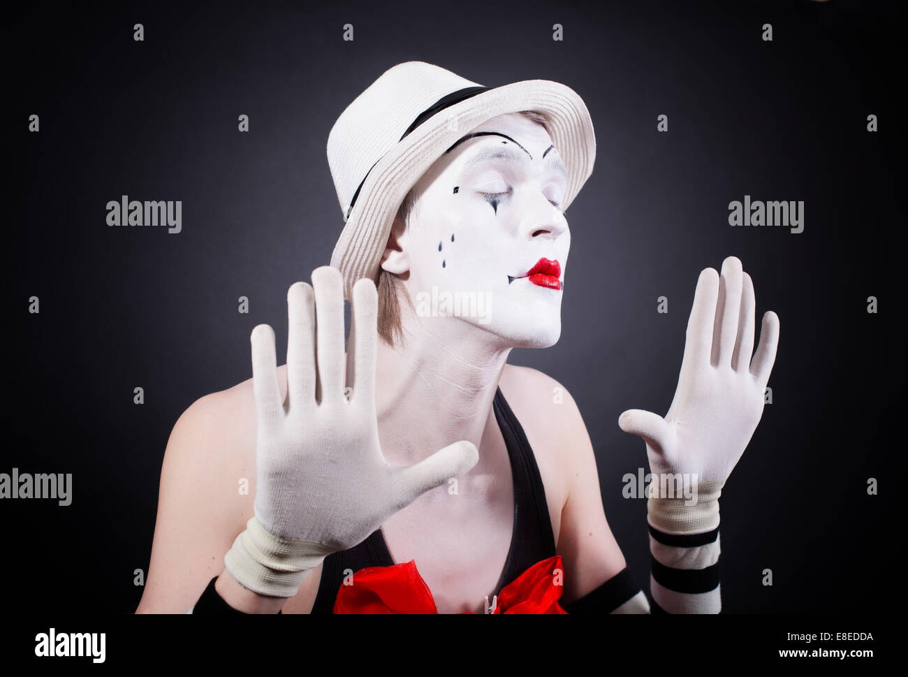 Portrait of theatrical mime on a black background Stock Photo - Alamy